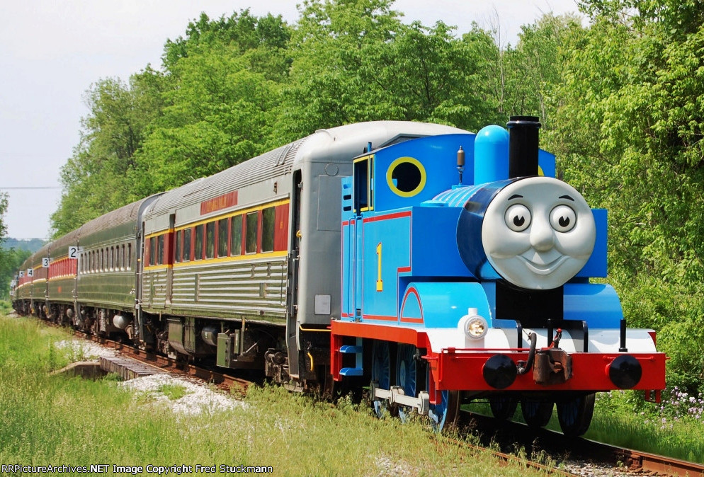 Thomas visits in May.
